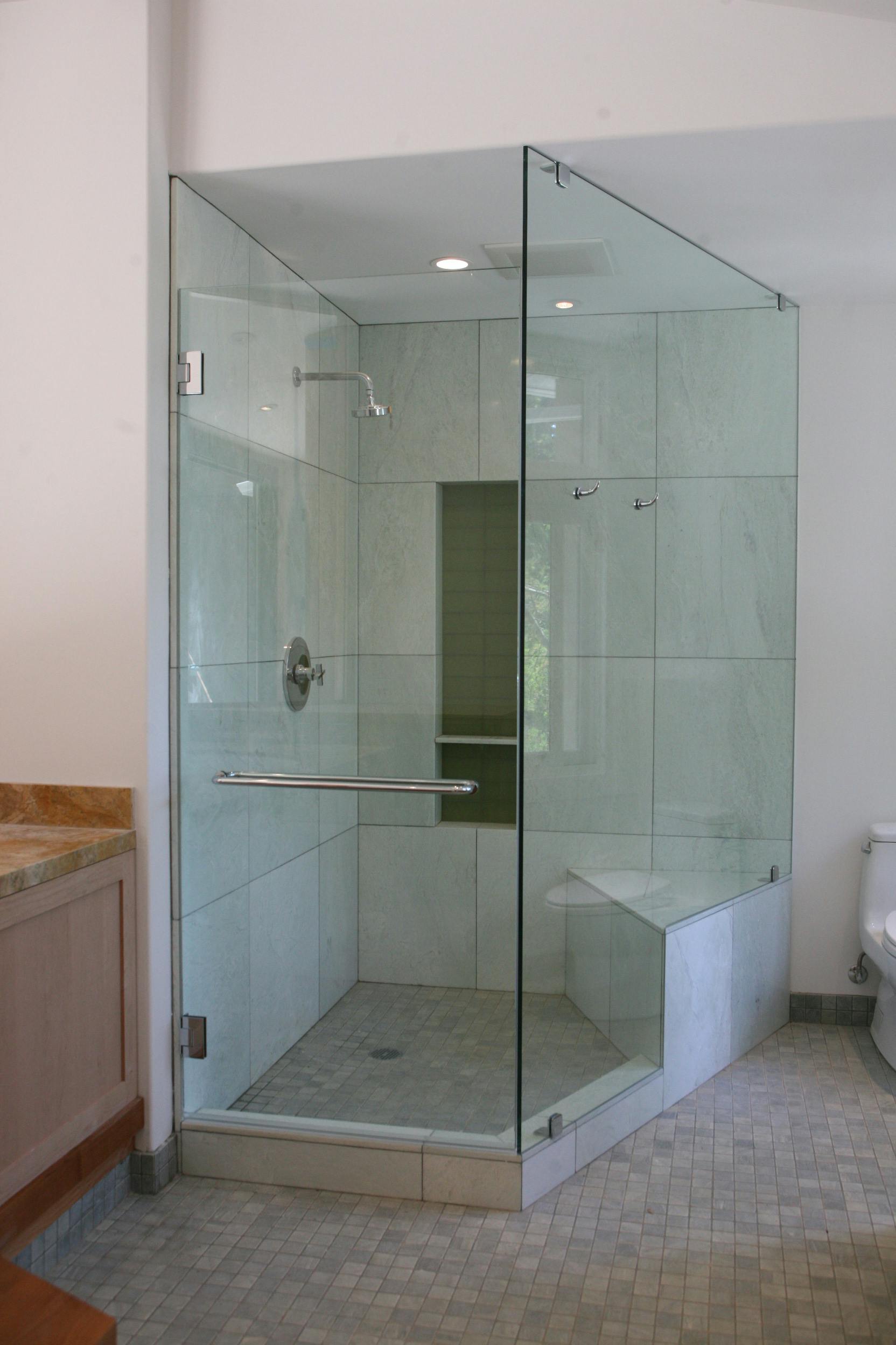 Neo-angle shower enclosure with through glass robe hooks