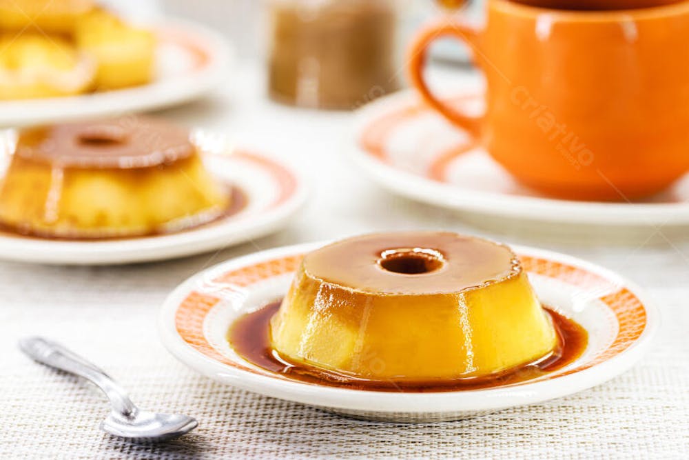 Brazilian condensed milk pudding flan with caramel sauce on a breakfast ...